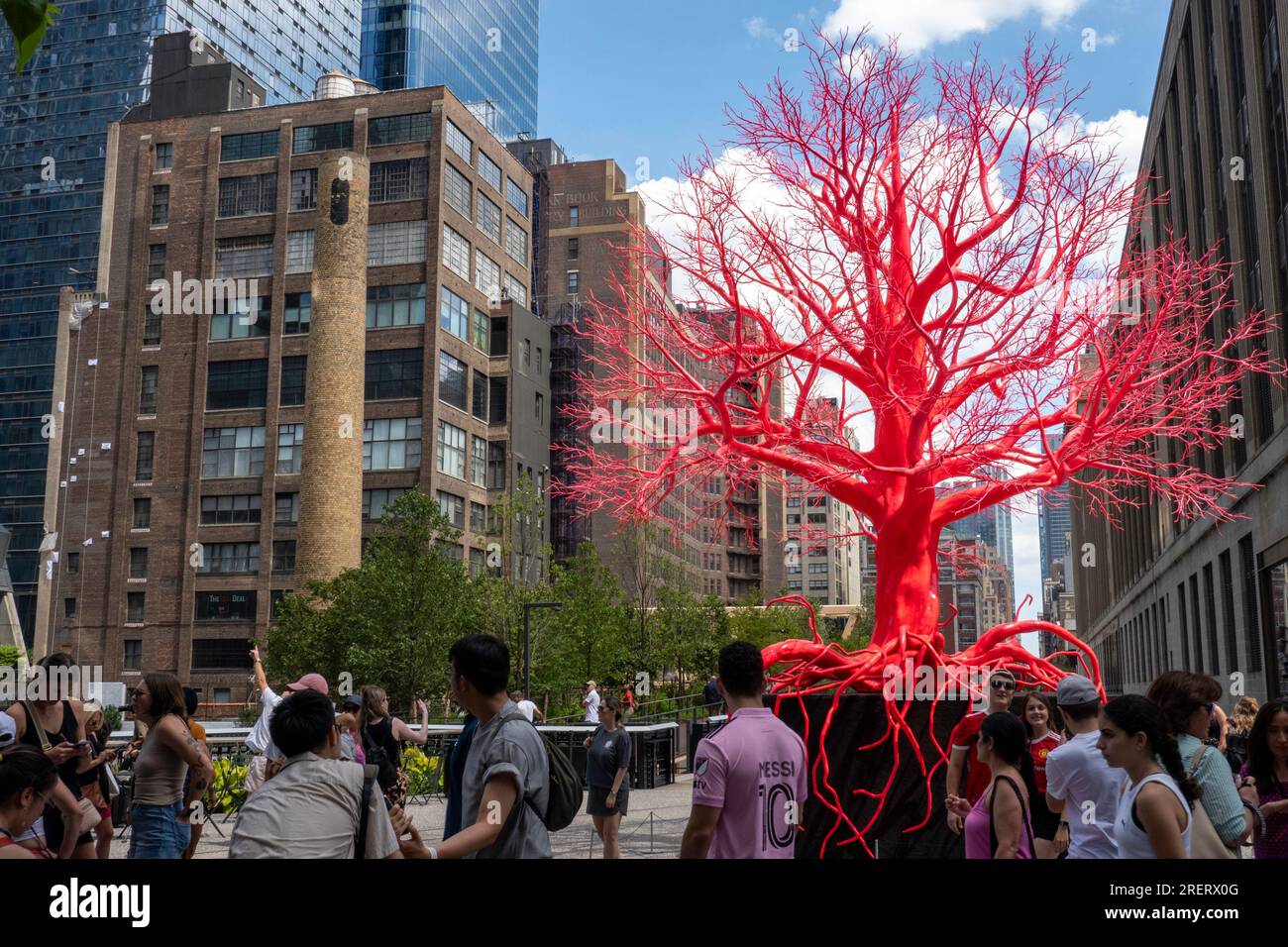 The old tree is a pink and red 25 foot tall sculpture comprised of man ...