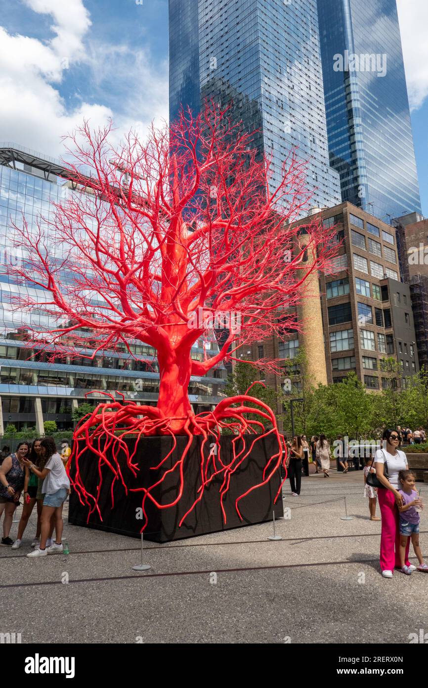The old tree is a pink and red 25 foot tall sculpture comprised of man ...