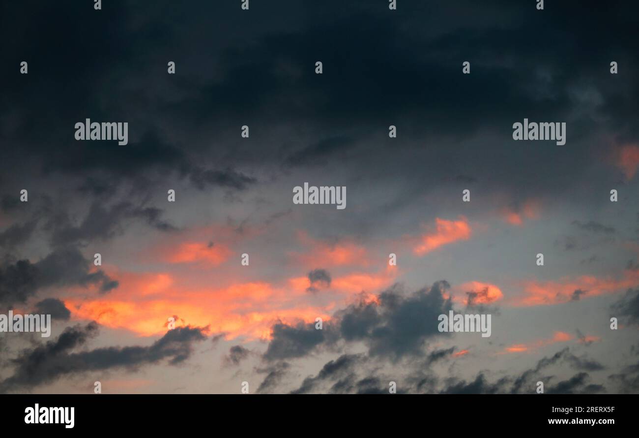 a group of clouds in the sky Stock Photo - Alamy