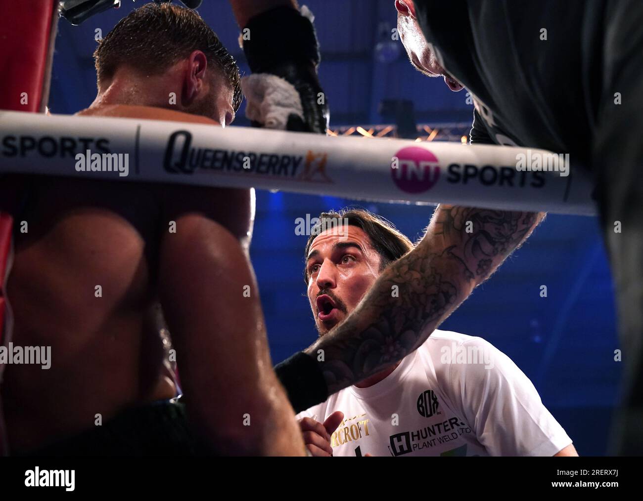 Trainer Anthony Crolla speaks to James Moorcroft between rounds at the Telford International ...