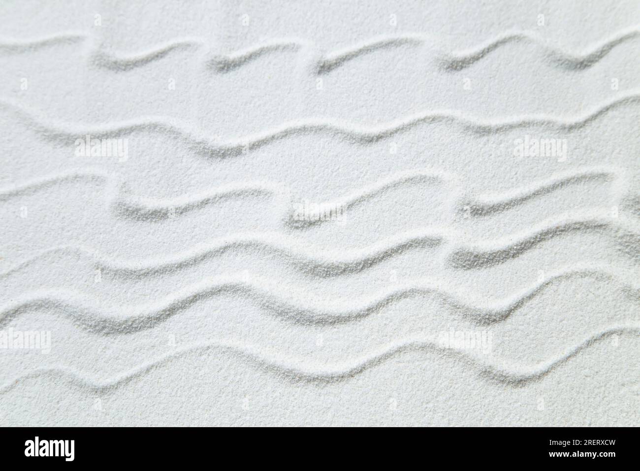 White sand with wave pattern Stock Photo - Alamy
