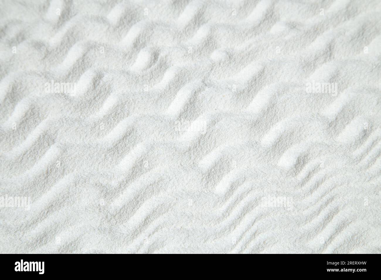 White sand with wave pattern Stock Photo - Alamy