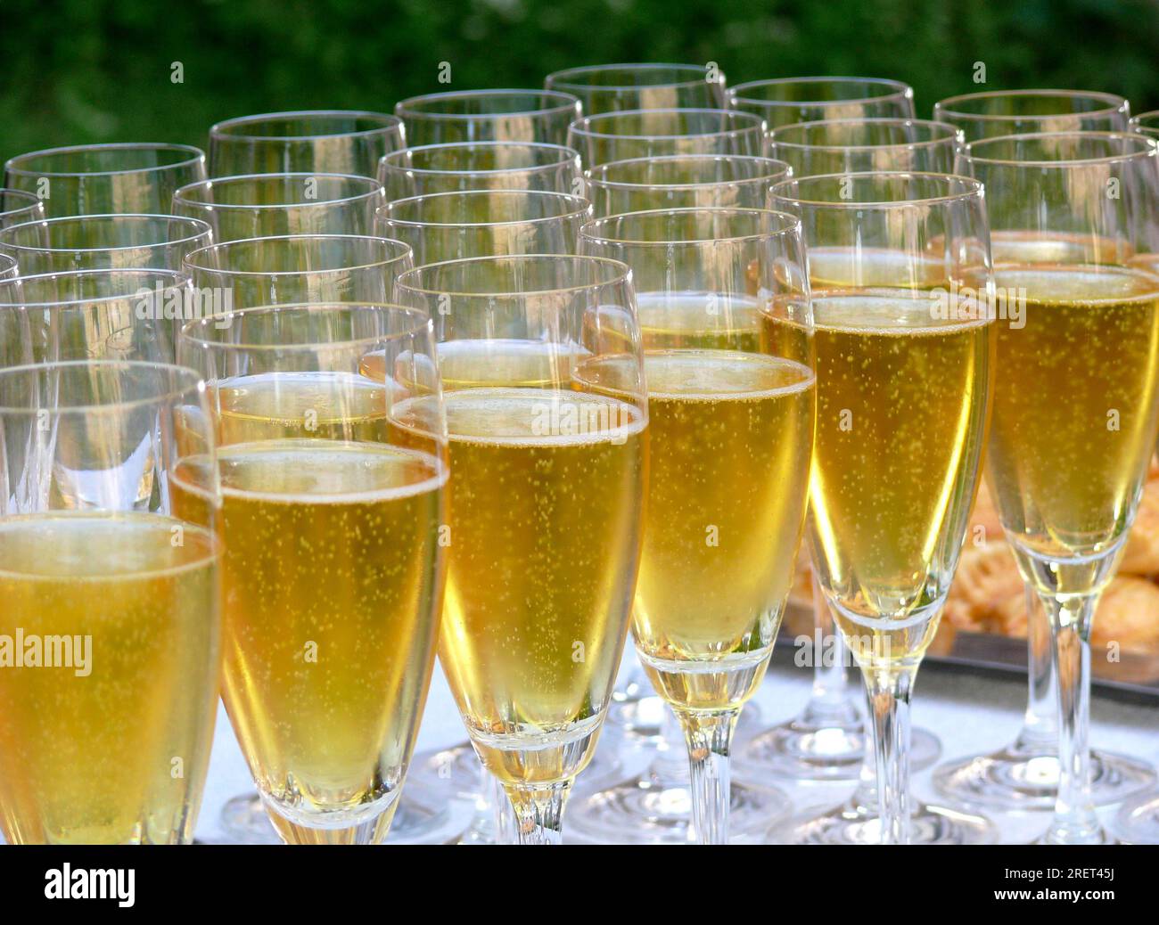 Champagne reception, pouring champagne, filling champagne glasses ...