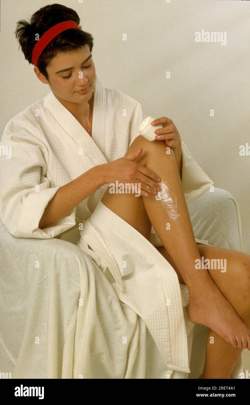 Cosmetics, woman creams legs Stock Photo - Alamy
