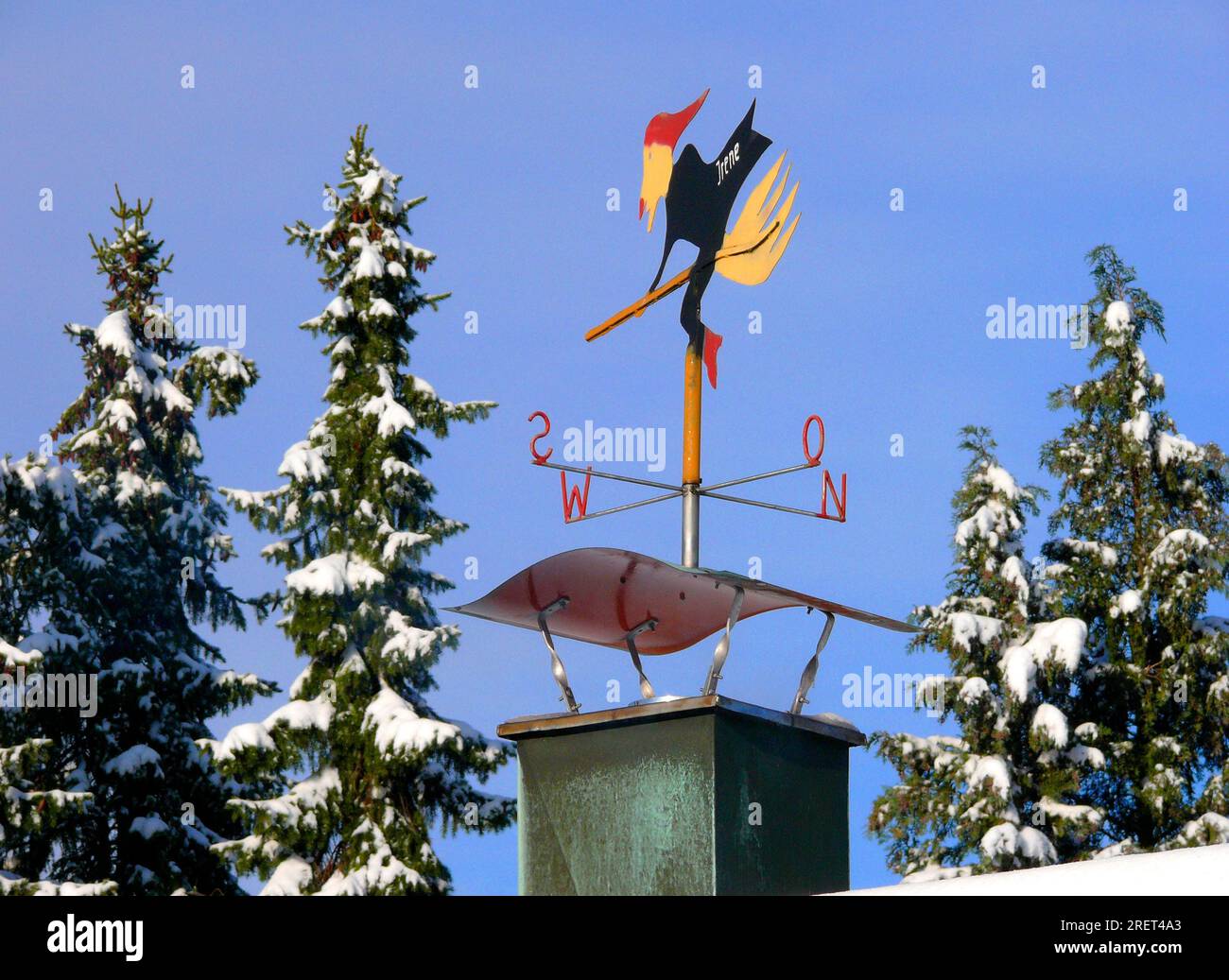 Weathercock with Snow in Winter, Weather Witch Fireplace Stock Photo - Alamy