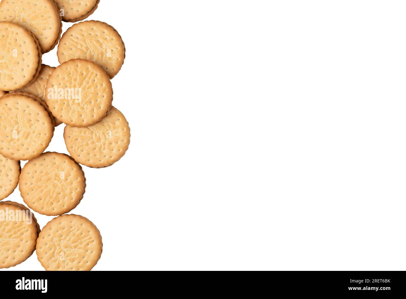 Group of double biscuits at the left edge of the picture, on white ...