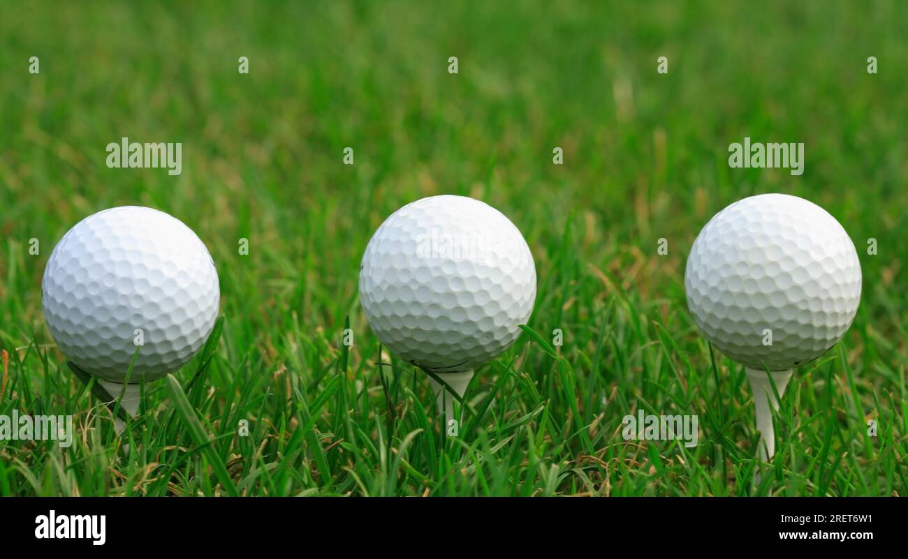 Golf club - 3 balls on the green Stock Photo - Alamy