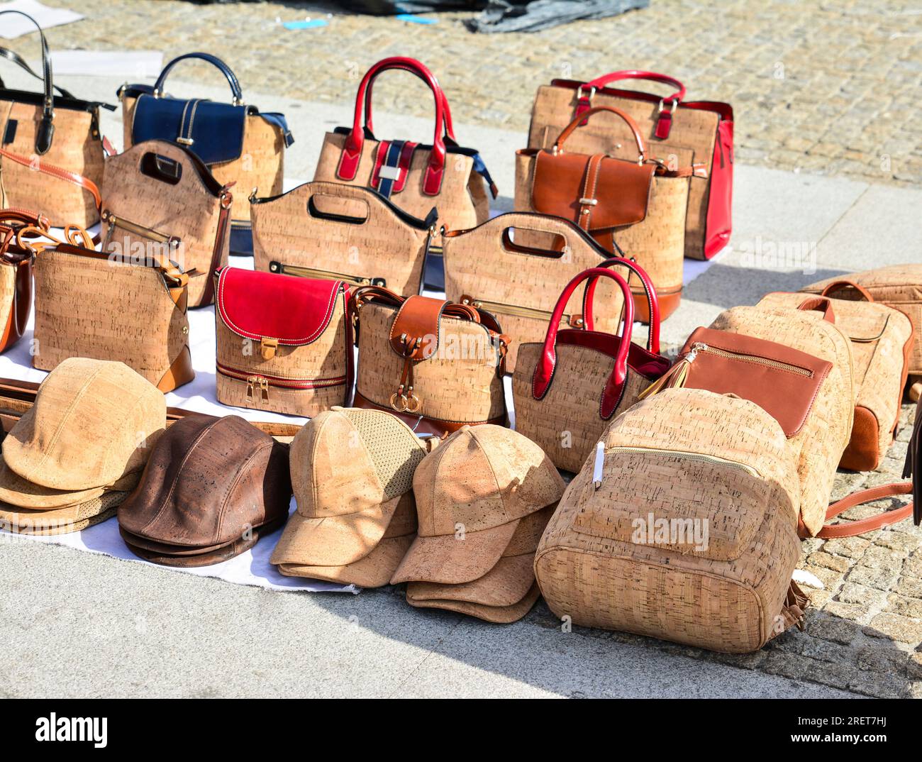 Variety of bags and souvenirs made from oak cork at the street market ...