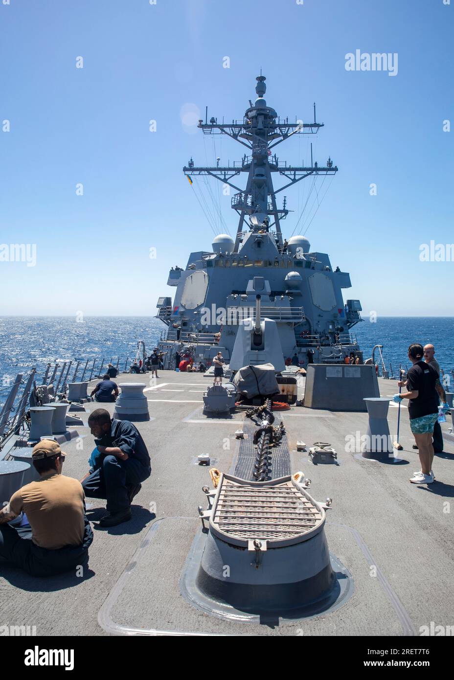 230726-N-CD453-1174 SEA OF JAPAN (July 26, 2023) Sailors scrub the ship ...