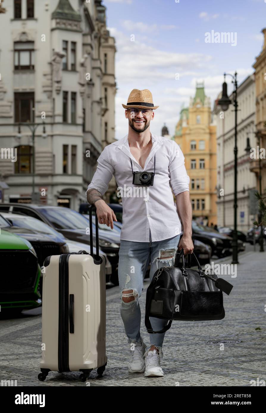 Travelling concept. Man with travel bag ready to travel on his vacation ...