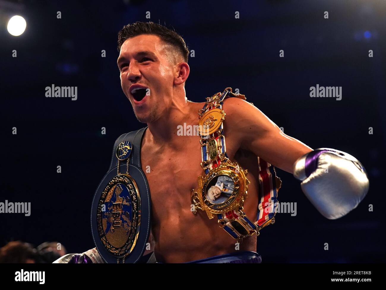 Liam Davies celebrates victory after defeating Jason Cunningham (not ...