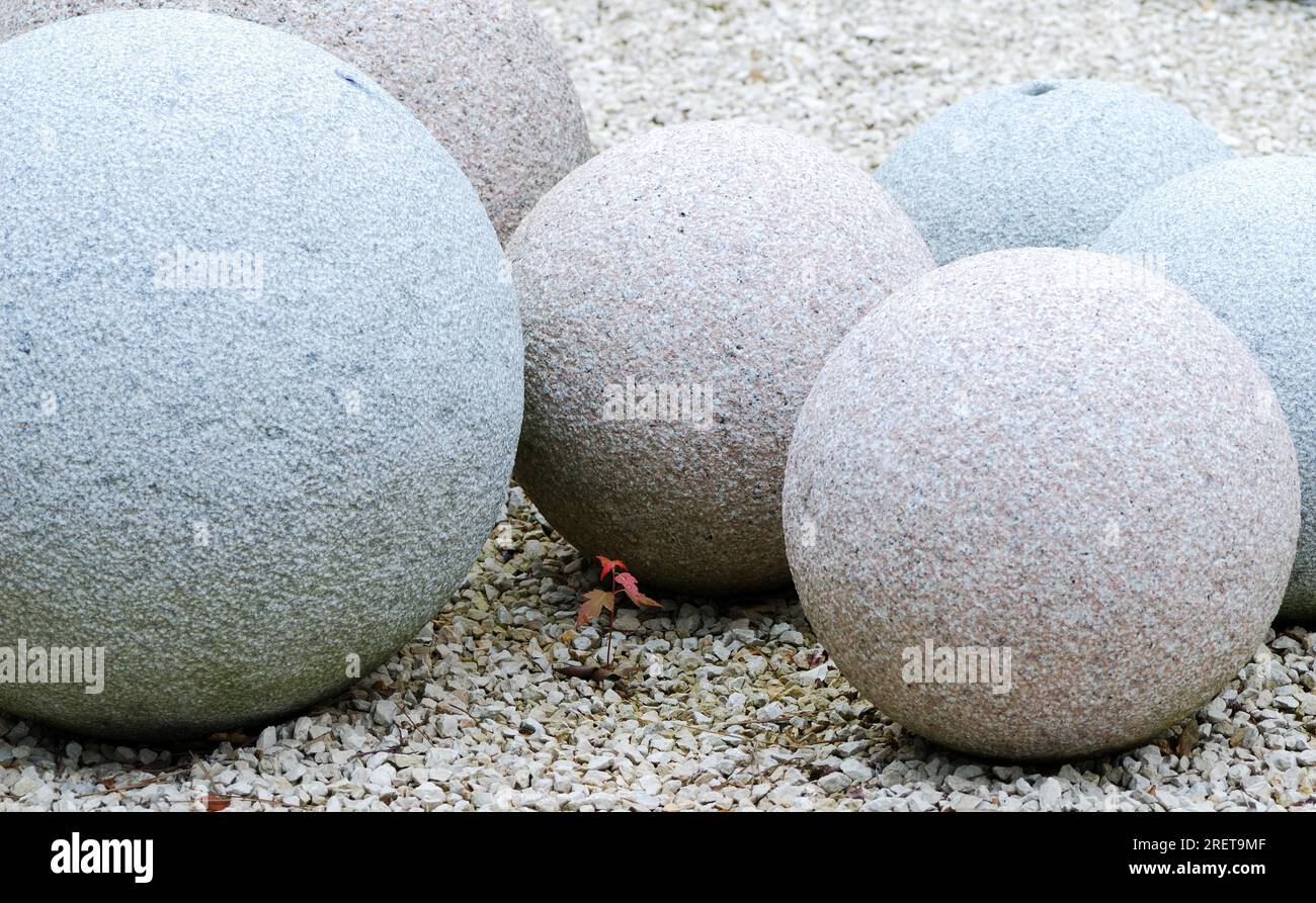 Stone balls with different size and color Stock Photo - Alamy