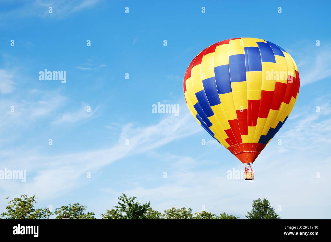 Flying hot air balloon seen at at a festival Stock Photo - Alamy