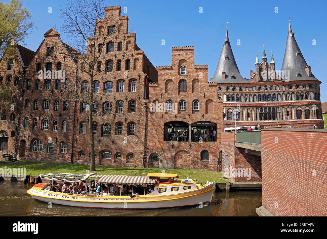 Excursion boat on the Stadttrave, former salt warehouses and Holsten ...