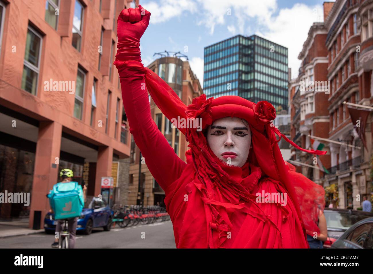 A Member Of The Red Rebels Seen Making Gestures During The
