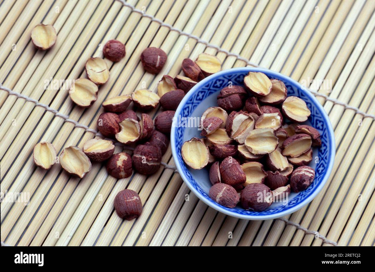Lotus kernels in shell Stock Photo - Alamy