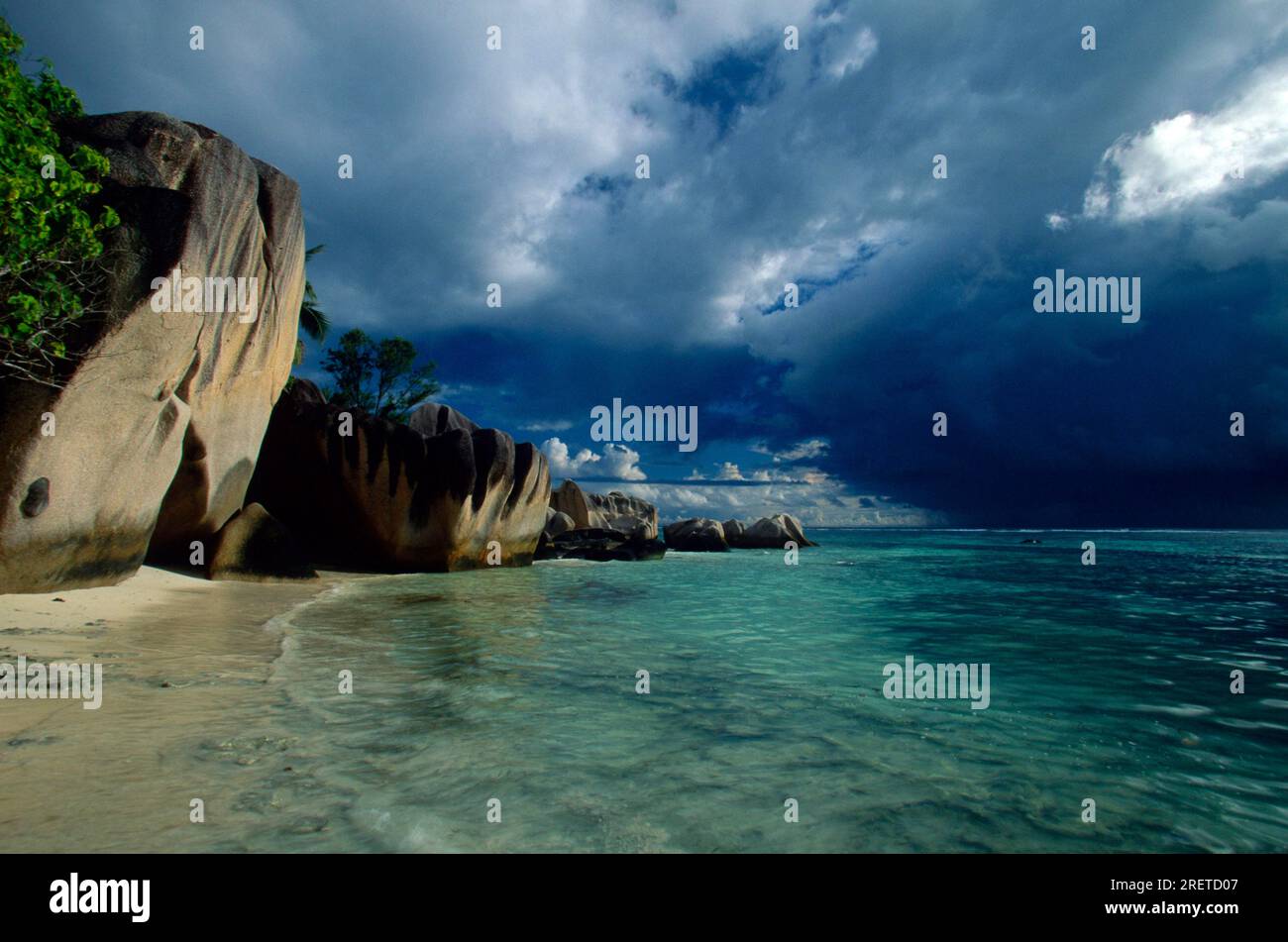 Storm over tropical beach, Anse Source d'Argent, La Digue Island ...