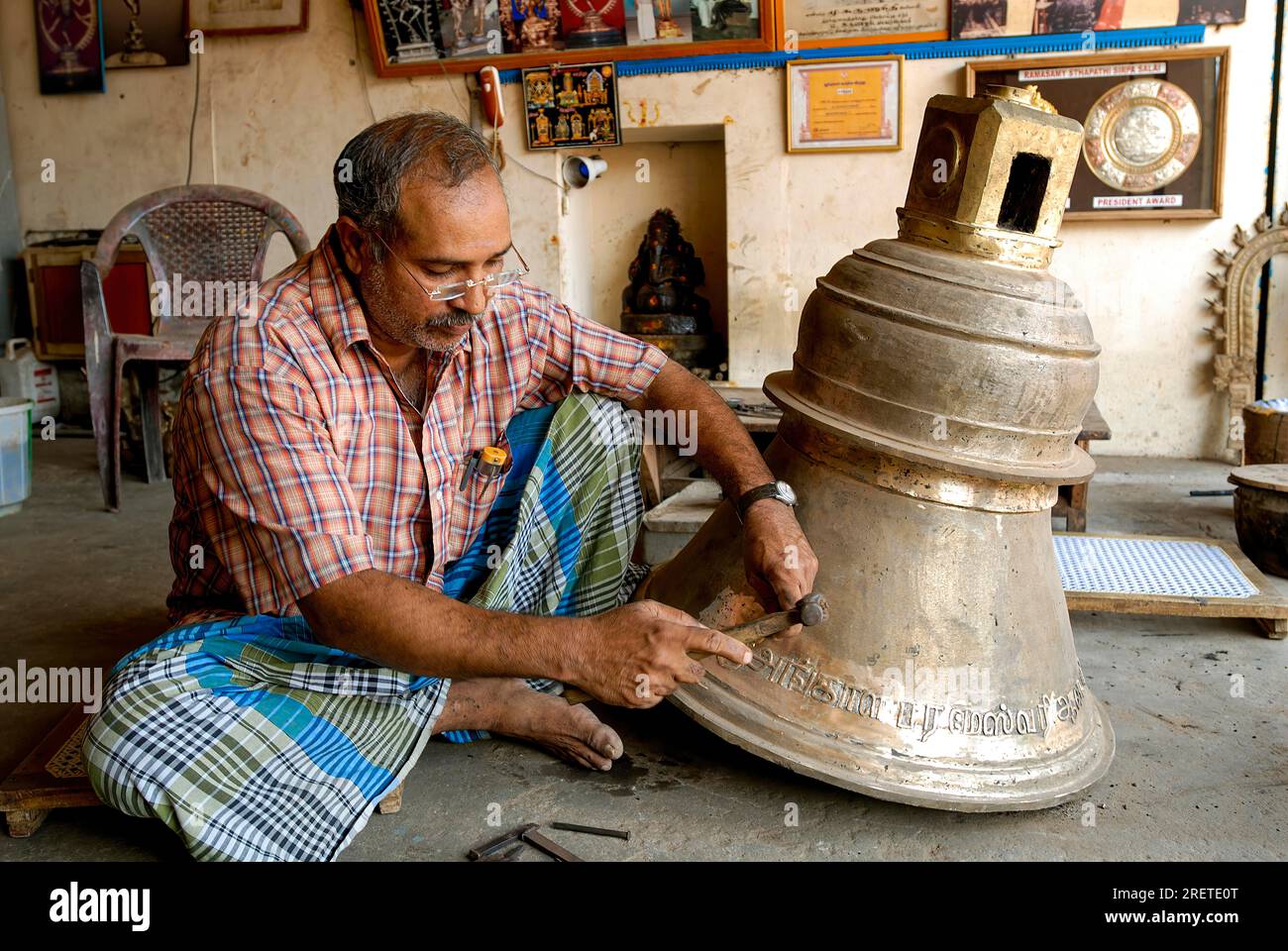 Artisan making a temple bell in Kumbakonam, Tamil Nadu, India, Asia ...