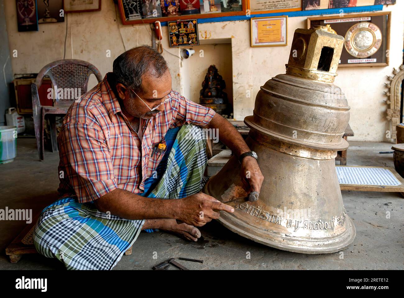 Artisan making a temple bell in Kumbakonam, Tamil Nadu, India, Asia ...