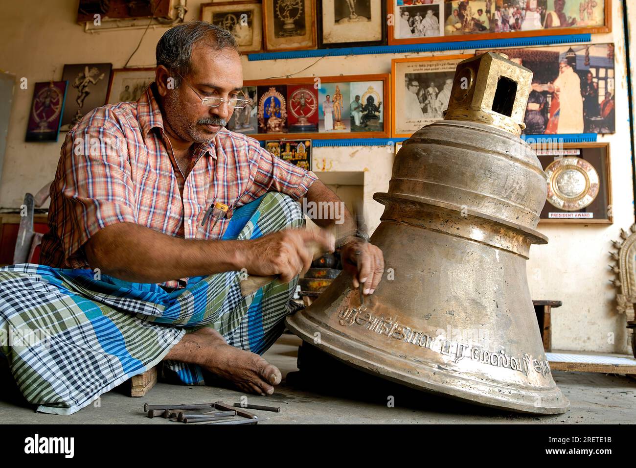 Artisan making a temple bell in Kumbakonam, Tamil Nadu, India, Asia ...