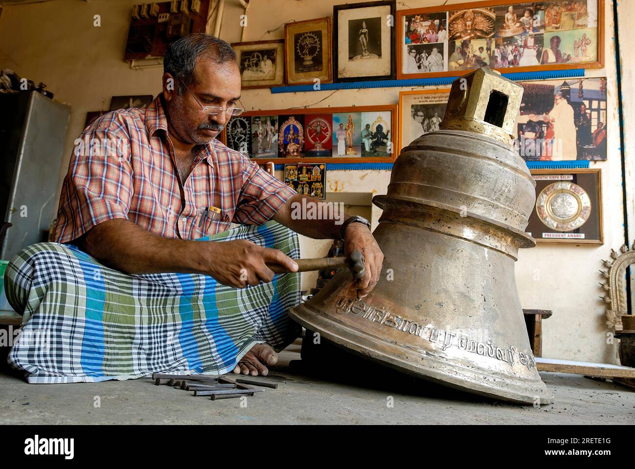 Artisan making a temple bell in Kumbakonam, Tamil Nadu, India, Asia ...