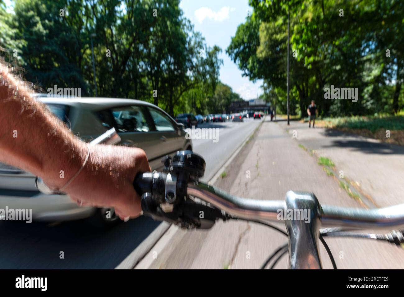 Cycling from a first-person perspective on a cycle path in Cologne ...