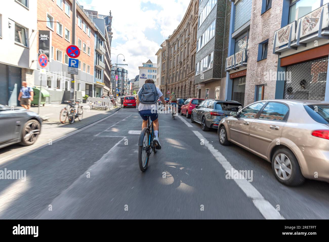 Cycling from a first-person perspective on a street in Cologne, North ...