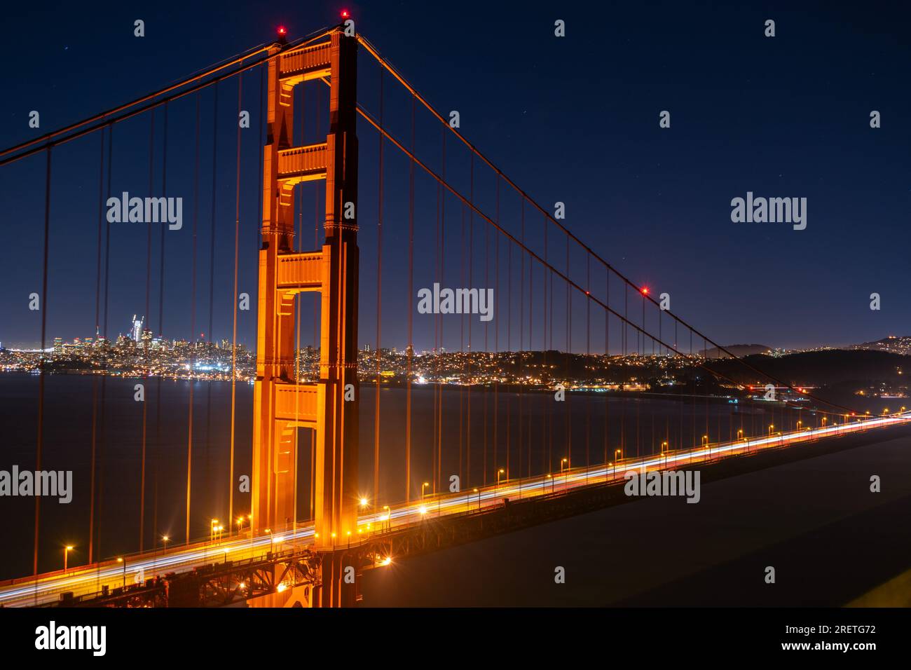 Golden Gate Bridge lights up the San Francisco night Stock Photo - Alamy