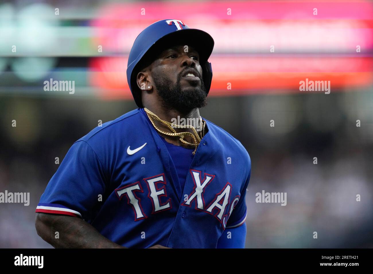 Texas Rangers' Adolis Garcia watches a video display as he makes his ...