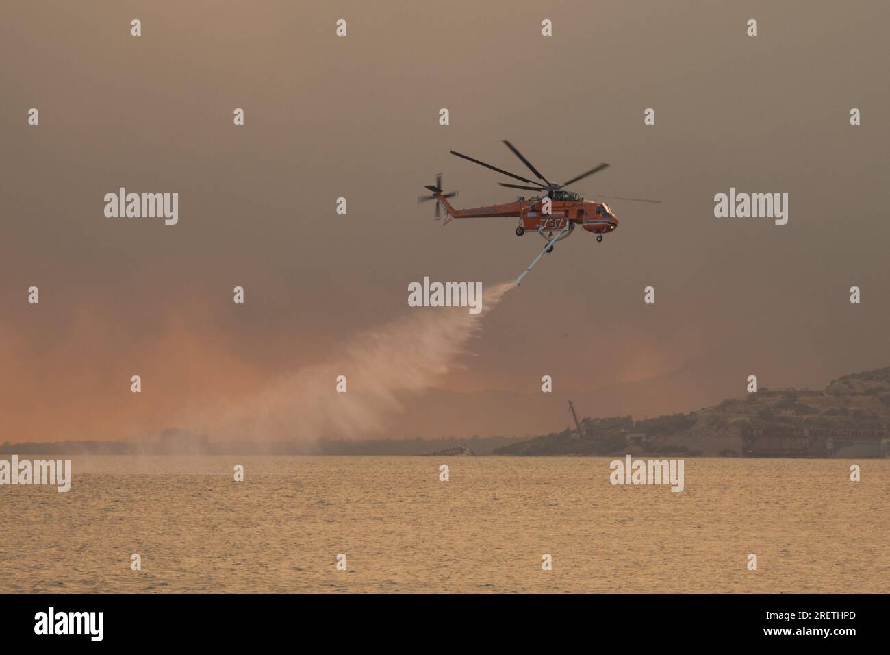 Elefsina, Greece 07.18.23: Firefighting helicopter refills water to ...