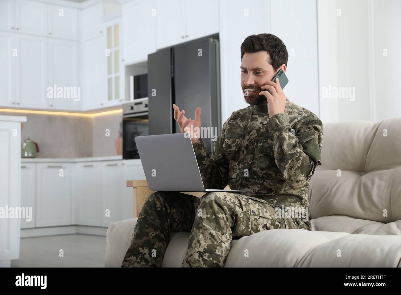 Military person on phone hi-res stock photography and images - Alamy
