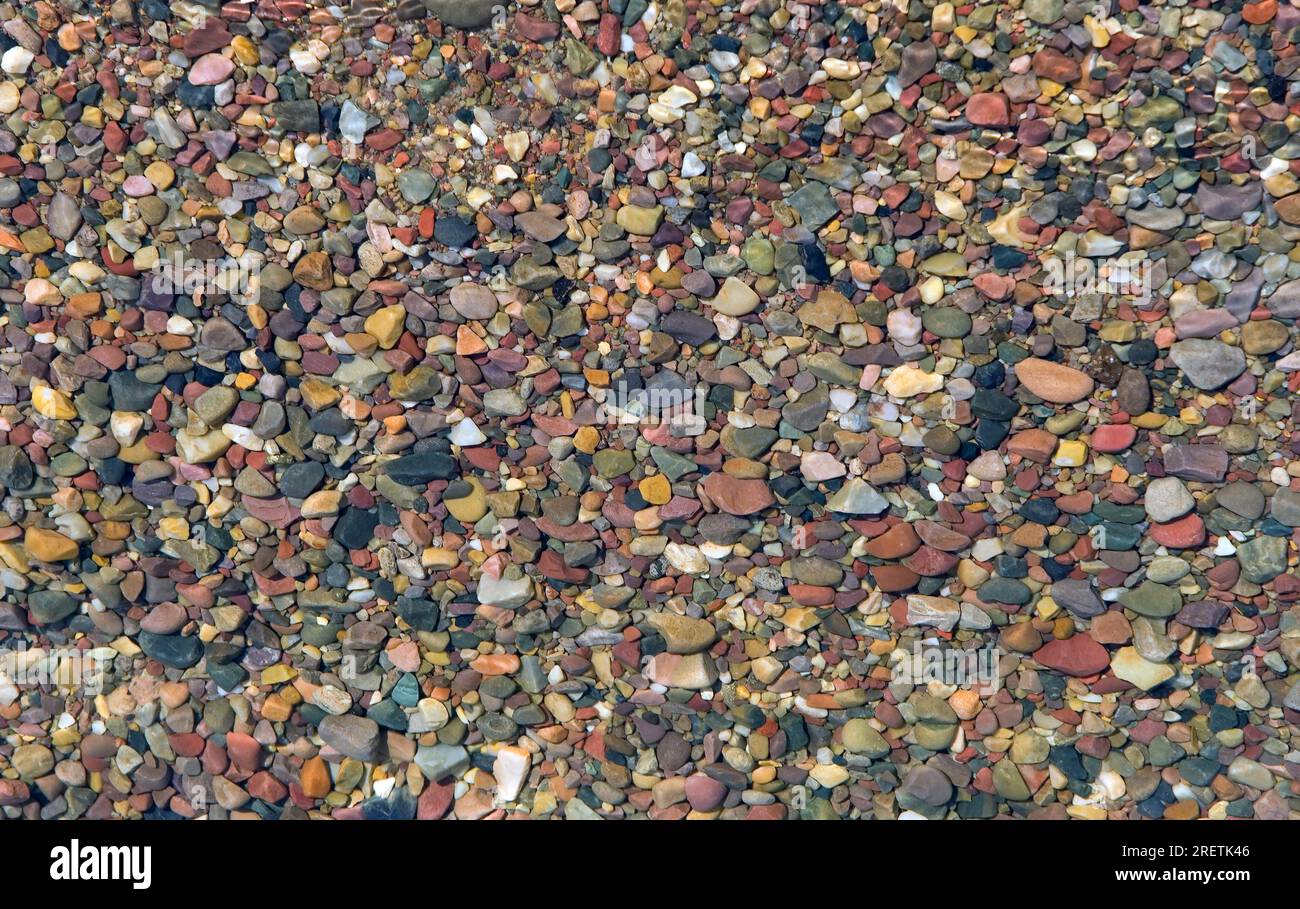 Pebbles seen through sparkling clear water in lake in Grand Tetons ...