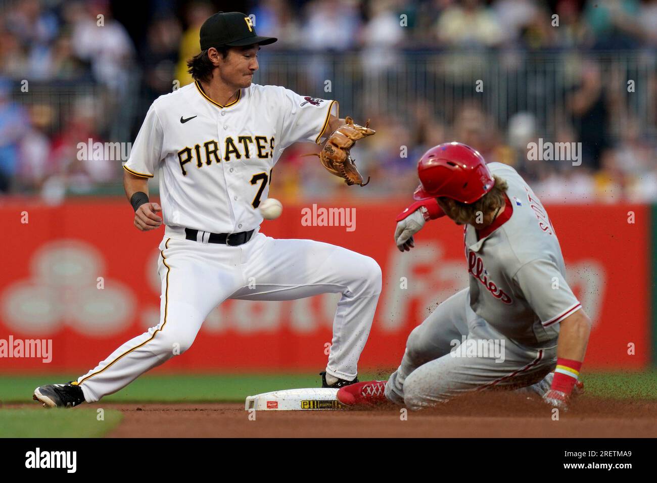 Philadelphia Phillies' Bryson Stott slides into second base with a ...