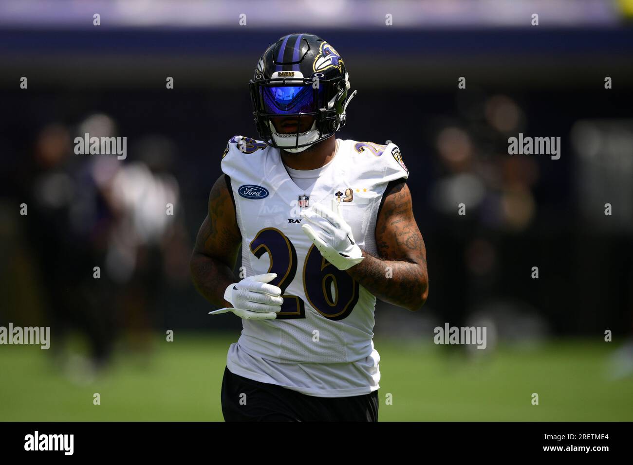 Baltimore Ravens safety Geno Stone (26) works out during the team's NFL ...