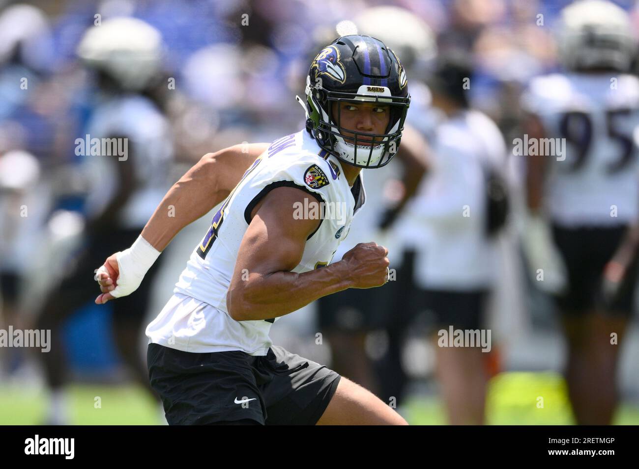 Baltimore Ravens safety Kyle Hamilton (14) works out during the team's ...