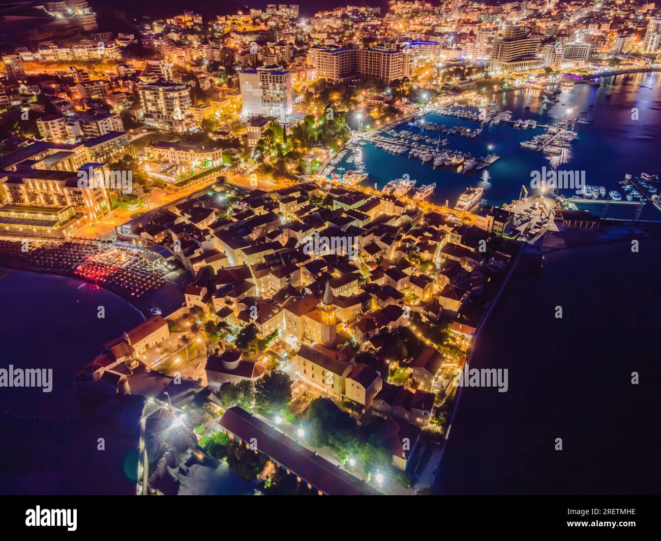 Budva city lights from Montenegro seen from above. Night view. Drone ...