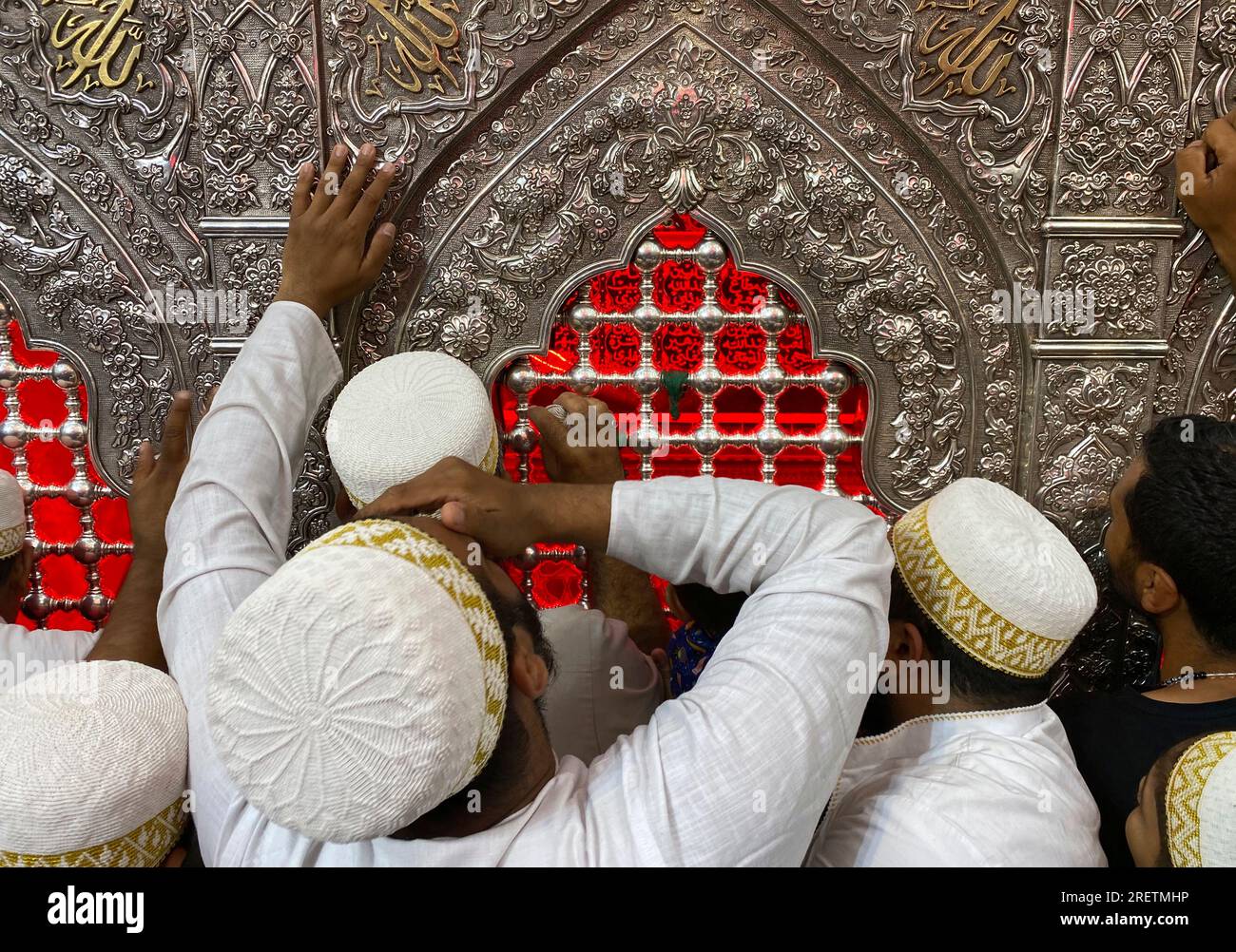 Shiite Muslim worshippers gather at the holy shrine of Imam Hussein ...