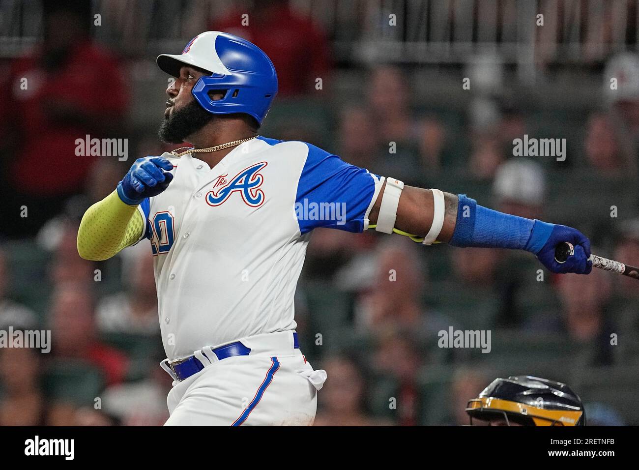 Atlanta Braves designated hitter Marcell Ozuna (20) watches his two-run ...