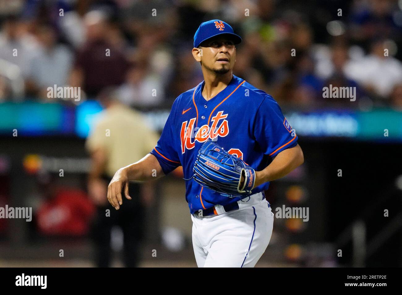 New York Mets starting pitcher Carlos Carrasco leaves during the third ...