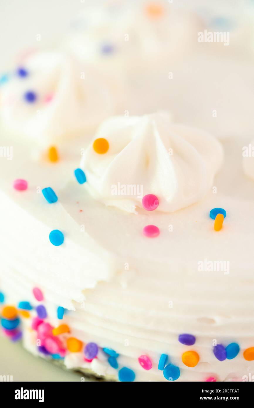 Birthday cake with funfetti sprinkles Stock Photo - Alamy