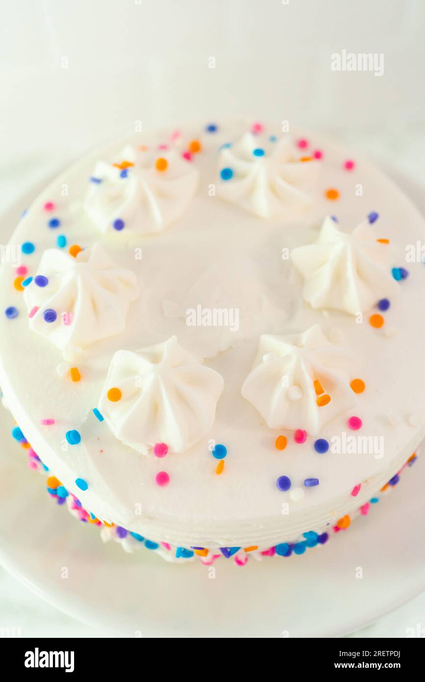 Birthday cake with funfetti sprinkles Stock Photo - Alamy
