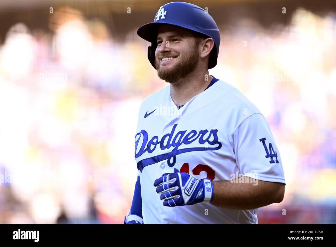 Los Angeles Dodgers' Max Muncy smiles after hitting a two-run home run ...