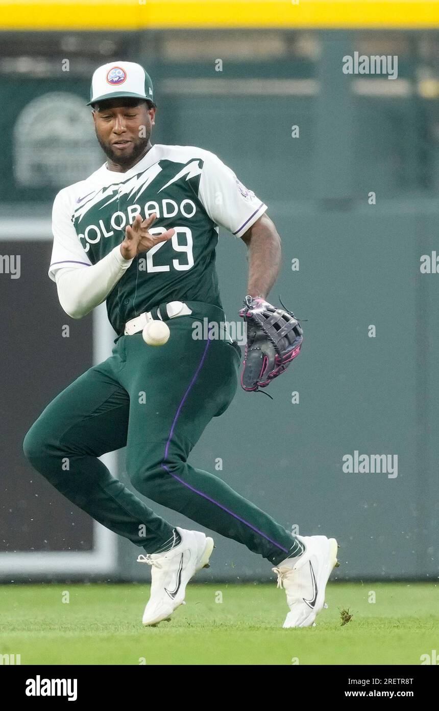 Colorado Rockies left fielder Jurickson Profar fields a single by ...