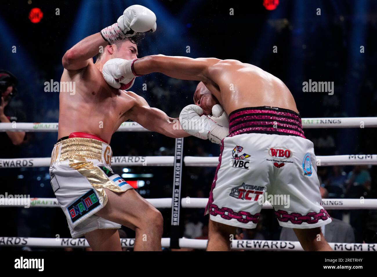 Isaac Cruz, right, and Giovanni Cabrera fight during their lightweight ...