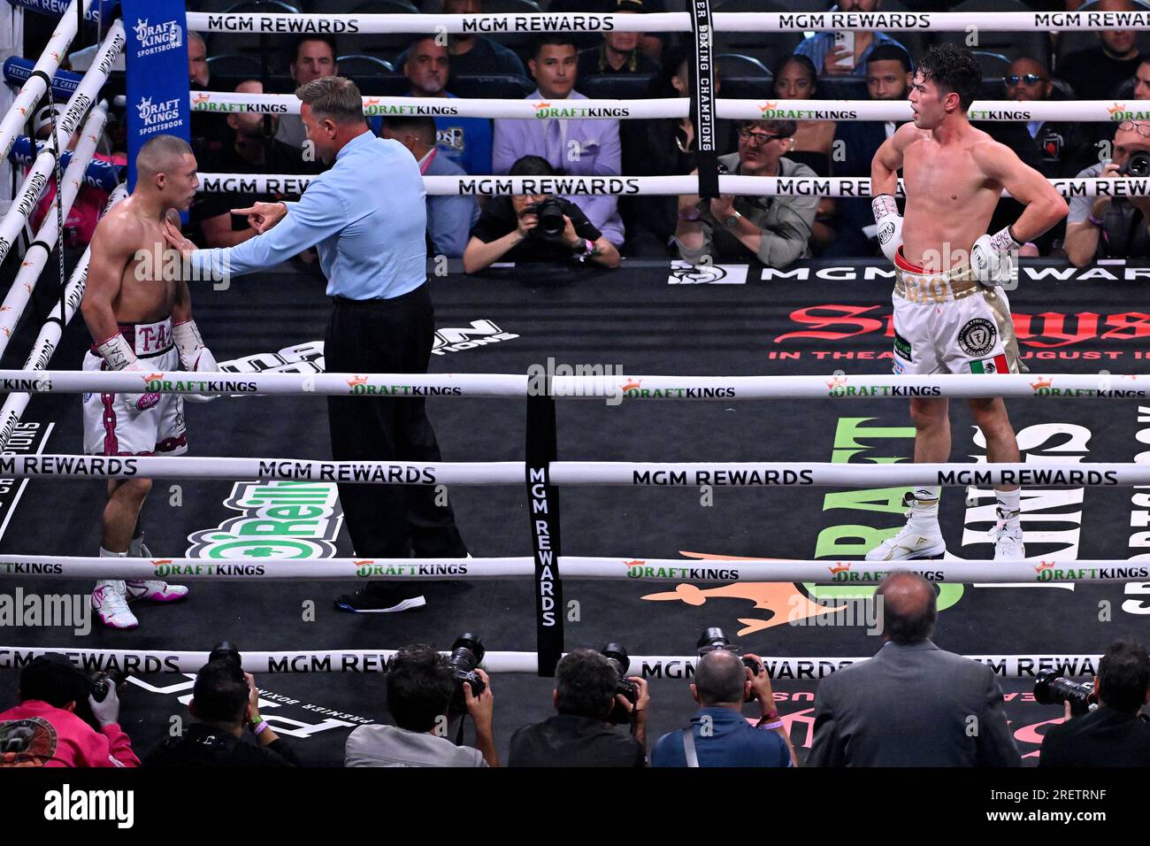 Referee Tom Taylor talks with Isaac Cruz, left, as Giovanni Cabrera ...