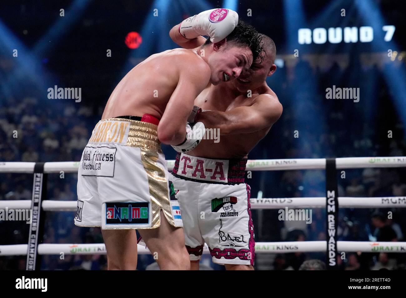 Isaac Cruz, right, and Giovanni Cabrera fight during their lightweight ...