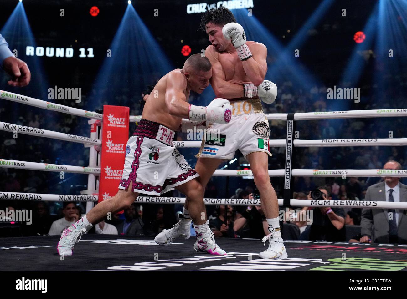 Isaac Cruz, left, and Giovanni Cabrera fight during their lightweight ...
