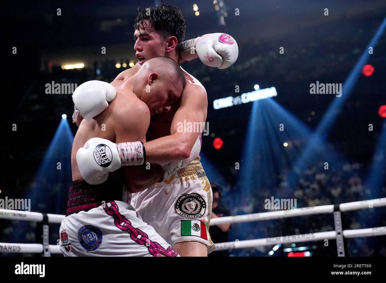 Isaac Cruz, left, and Giovanni Cabrera fight during their lightweight ...