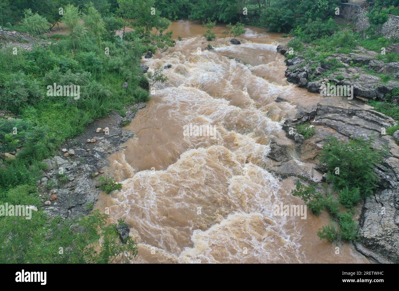 A flash flood caused by strong Typhoon "Super Typhoon Doksuri" is seen ...