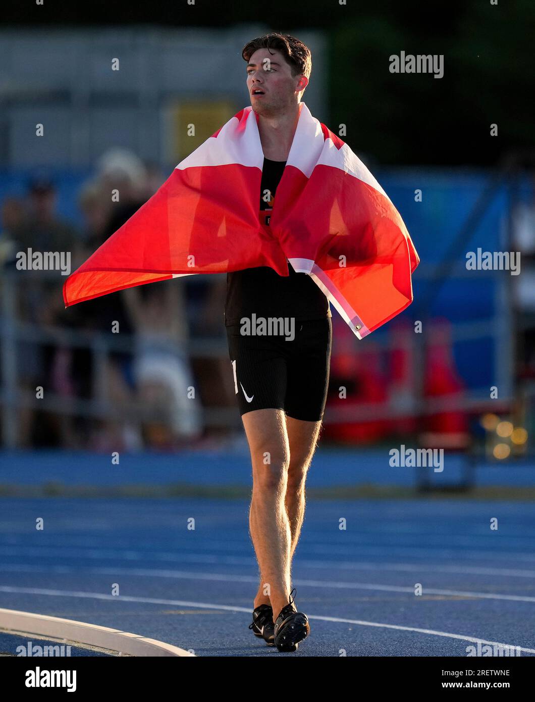 Craig Thorne celebrates with a Canadian flag after winning the men's ...